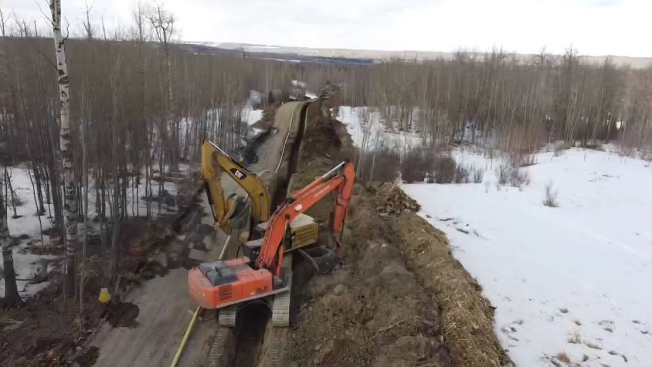 Pipeline Ditch Over Bends and Sags Fly By - YouTube