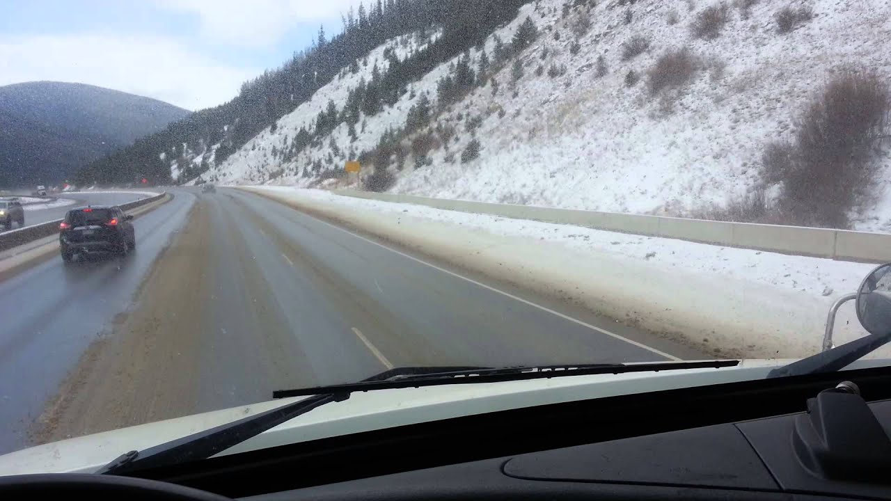 The Truck Driver Guy Driving in Snow and Ice Very Dangerous Road ...