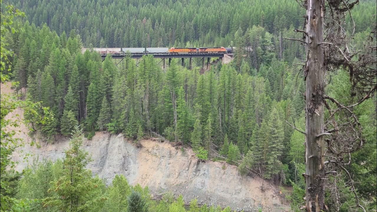 BNSF helpers roll downhill across Goat Lick Trestle near Essex, Montana - 8/10/2022 - YouTube