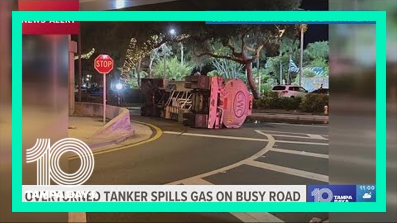 Gasoline tanker overturns while making U-turn, spills onto roadway in ...