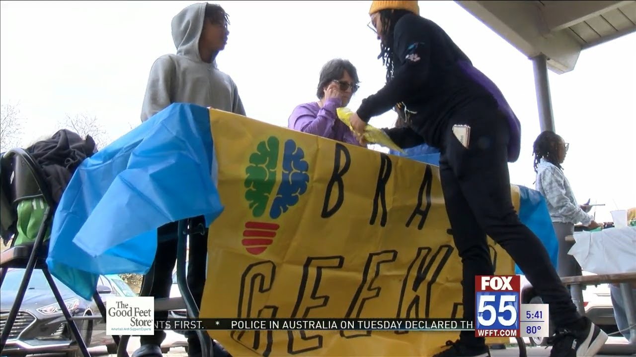 Kids Who Care: JAG student volunteers at Easter Egg Hunt - YouTube