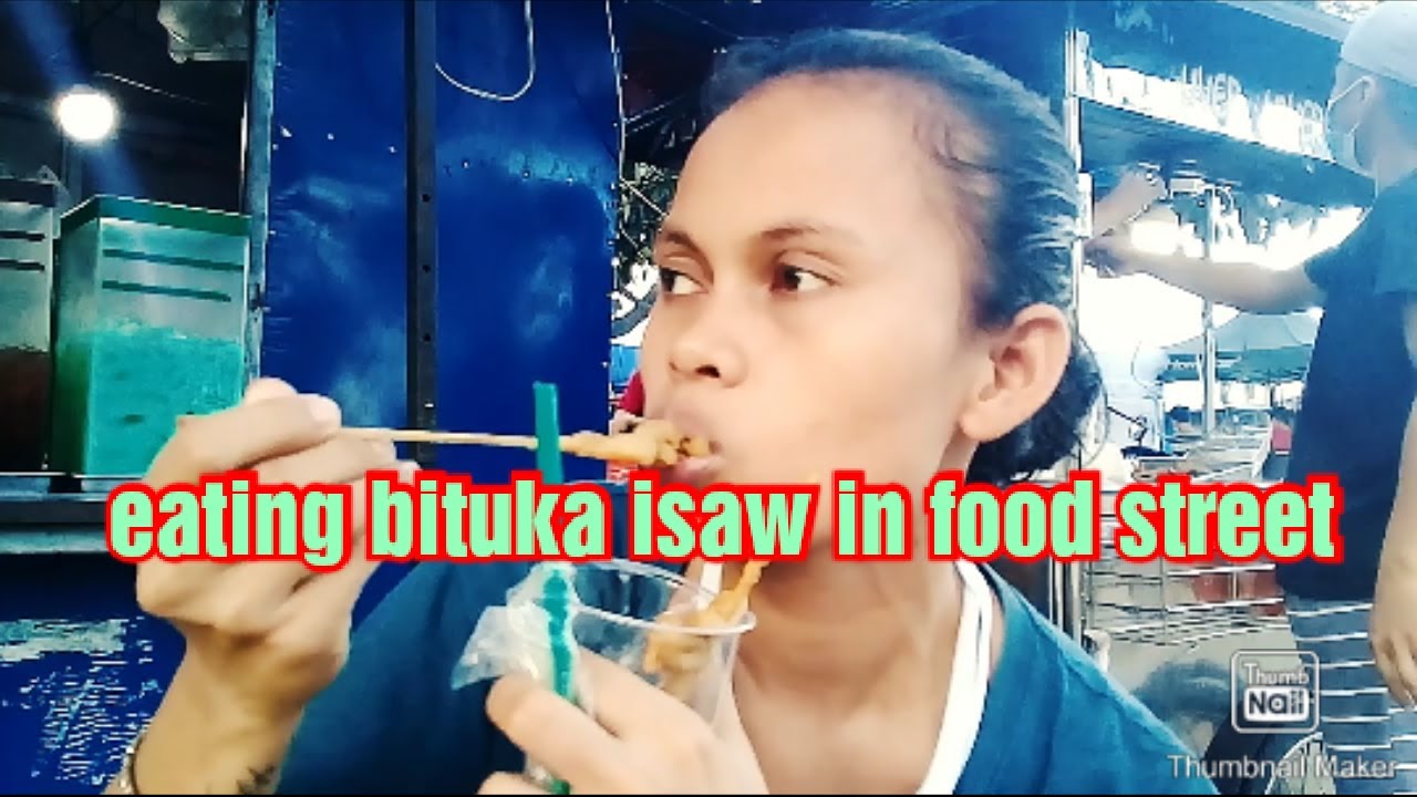 Eating isaw bituka in food street | isaw kau jan - YouTube