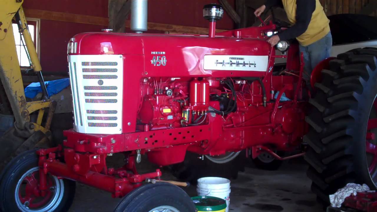Installing a rebuilt injector pump on a Farmall 450 - YouTube