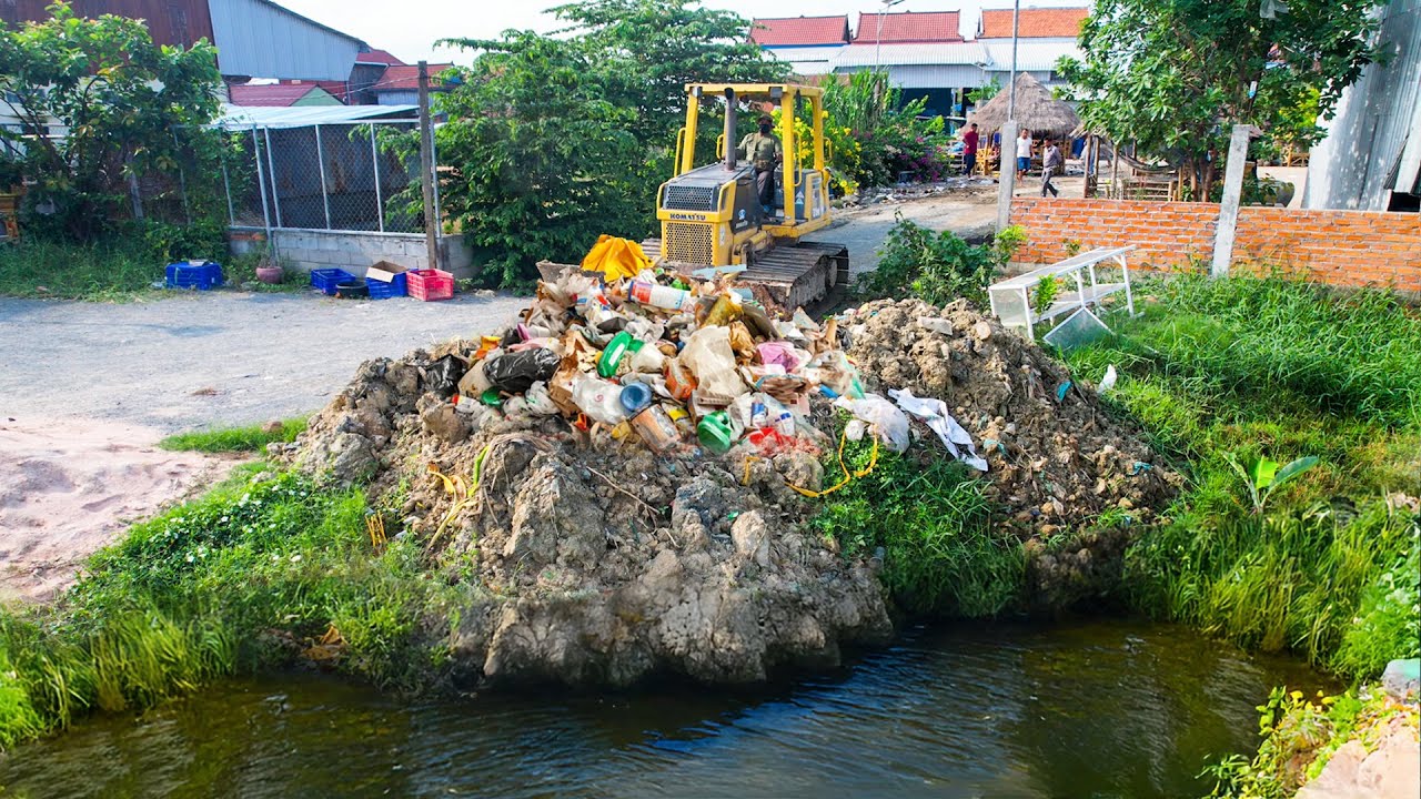 Starting A New Project.!! Filling Land Delete Garbage In Flooded Area By Komatsu D31PX Push Soil ...