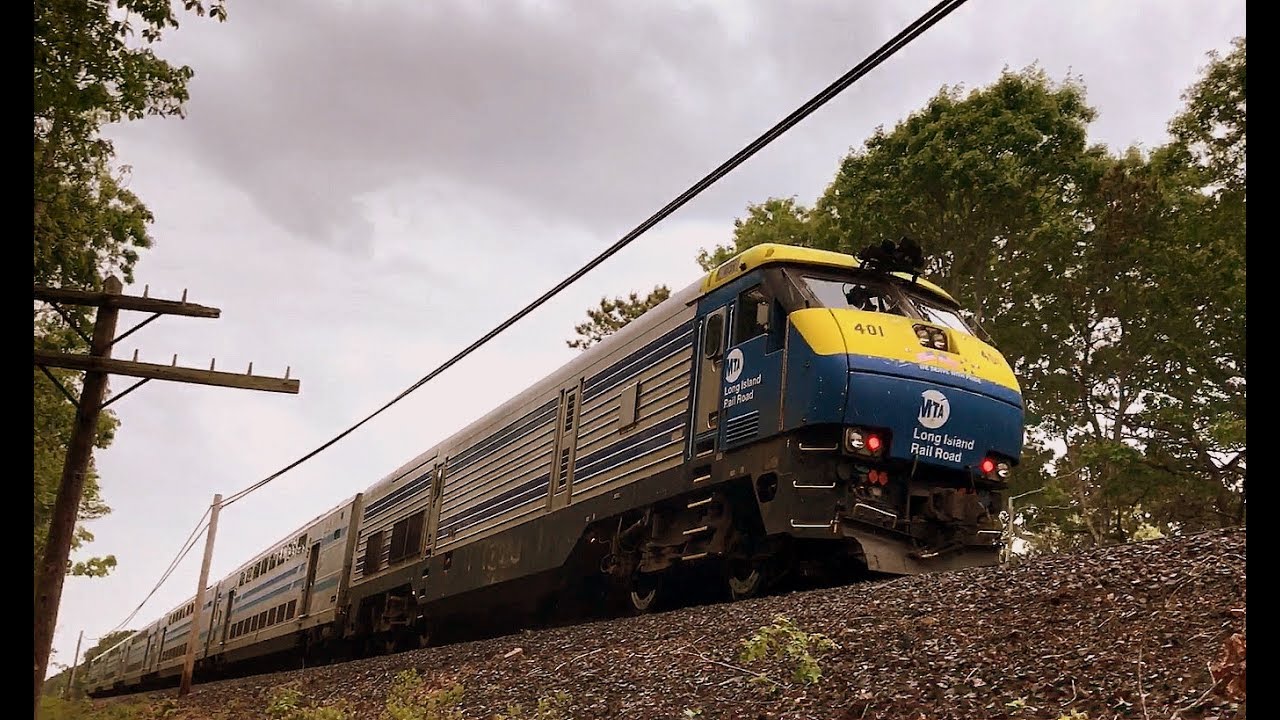 LONG ISLAND RR (LIRR) EMD DE30AC bi level service on a trestle near ...