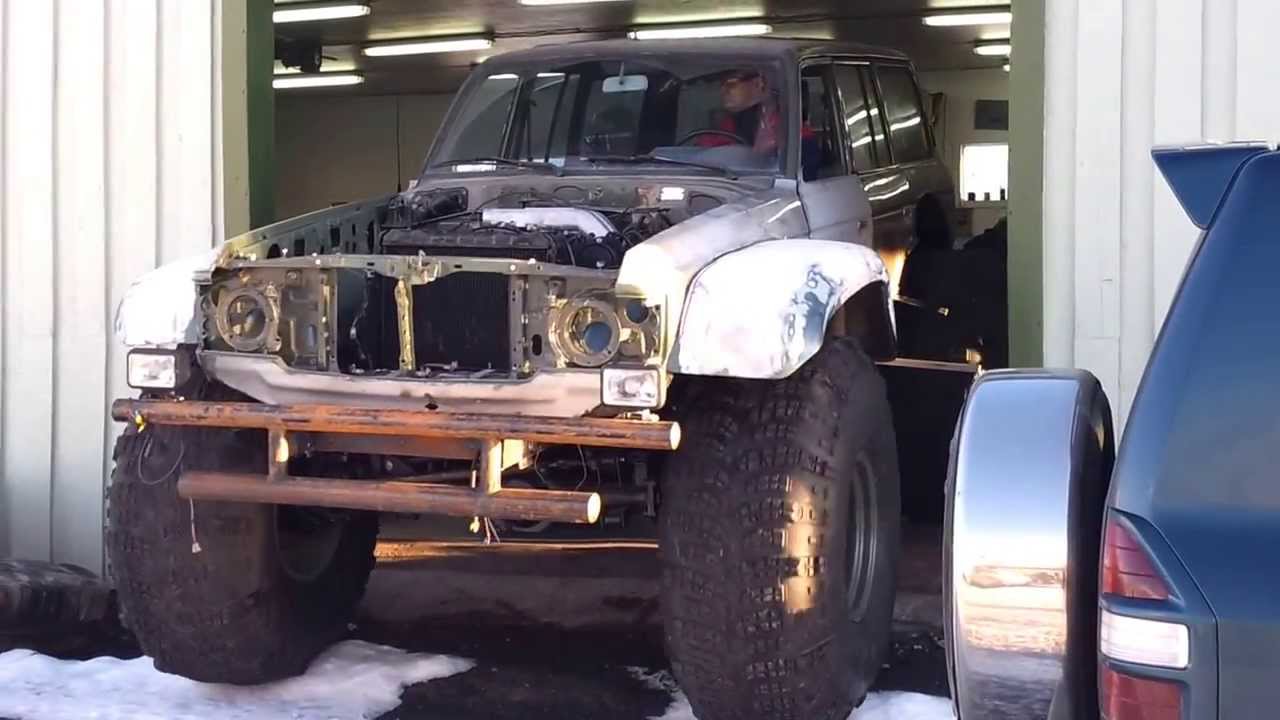 Toyota land cruiser on 54" boggers - YouTube