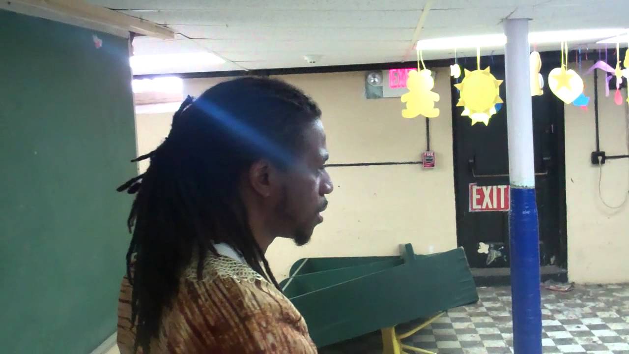 Baye Kemit shows damage done to Trenton's Garvey School - YouTube