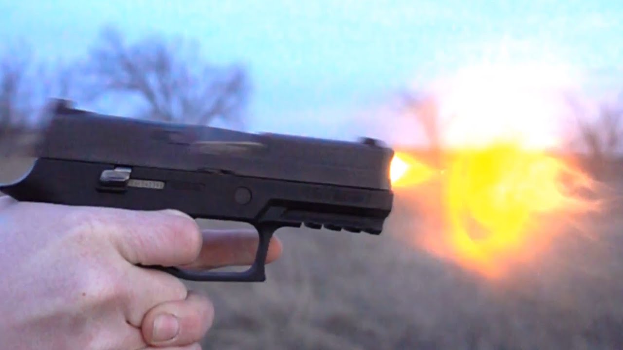 Sig sauer p250 40cal handgun slow motion!!!! - YouTube