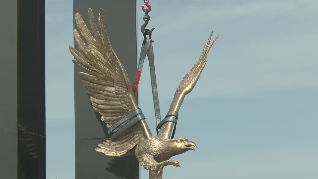 Bald Eagle put back in place at the 9/11 Memorial - YouTube