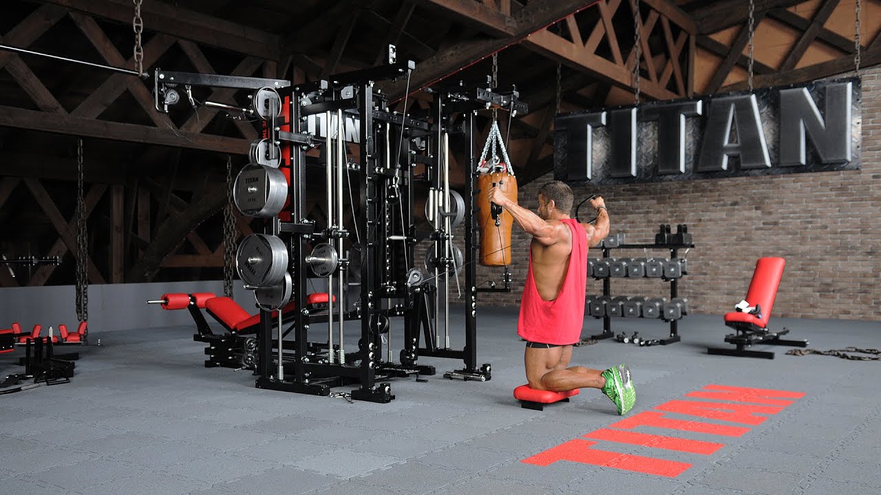 T1-X-226 - Cable Kneeling Reverse Fly - YouTube