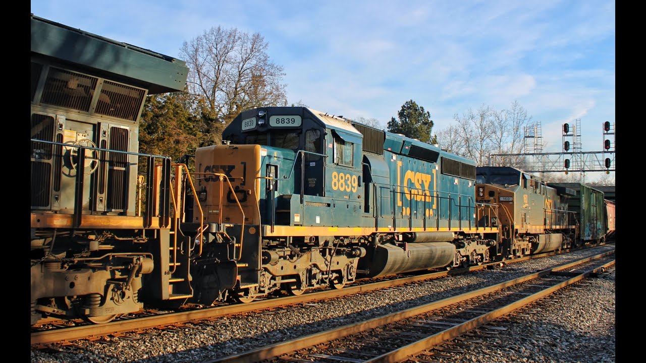 Ex Conrail SD40-2 #8839 on CSX M421-19 as it meets MARC P844-21 in St ...