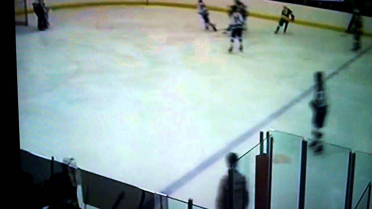 #20 Aaron Ryback in white Alexandria at center, wins faceoff, makes ...