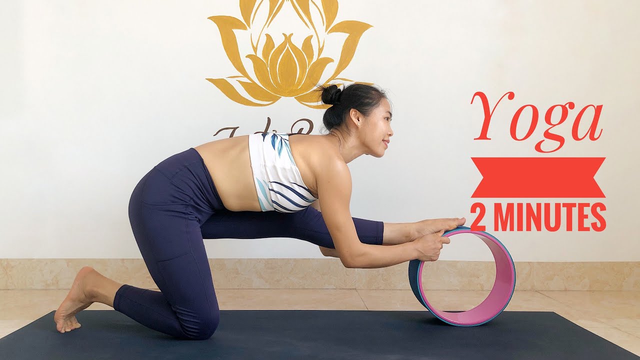 Yoga stretching legs with Wheel - YouTube