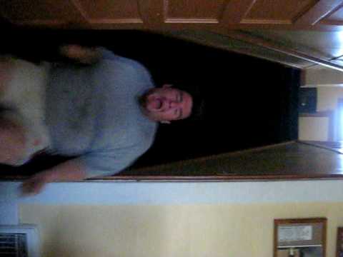 Fat man about to poop himself, sliding down stairs