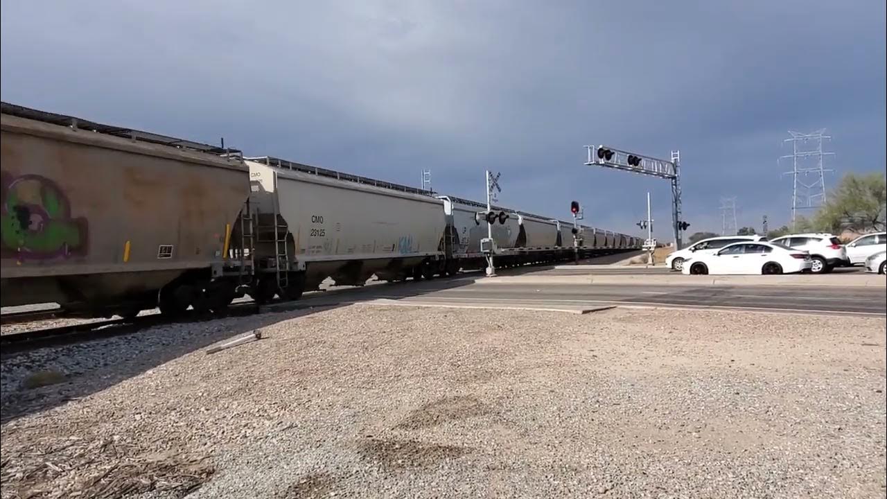 Westbound Grain Train UP 5301 leads by West Cortaro Farms Road - YouTube
