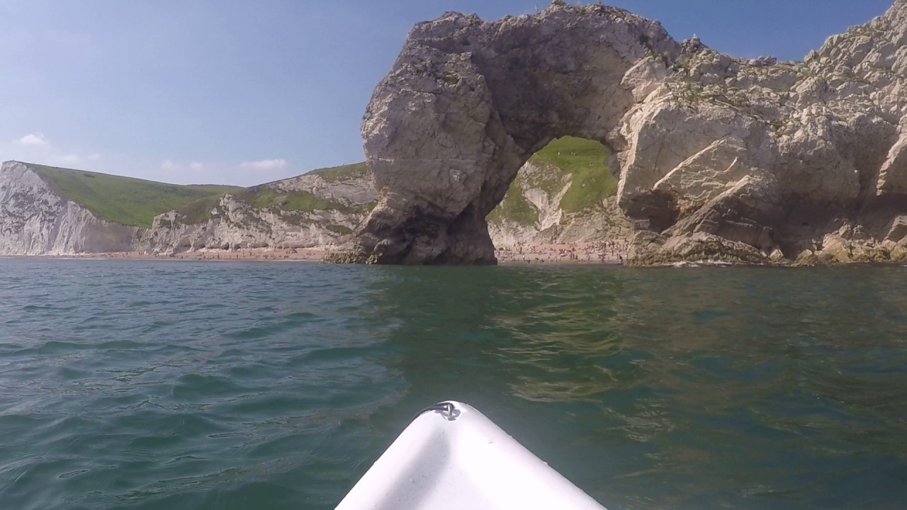 kayaking through Durdle Door - YouTube