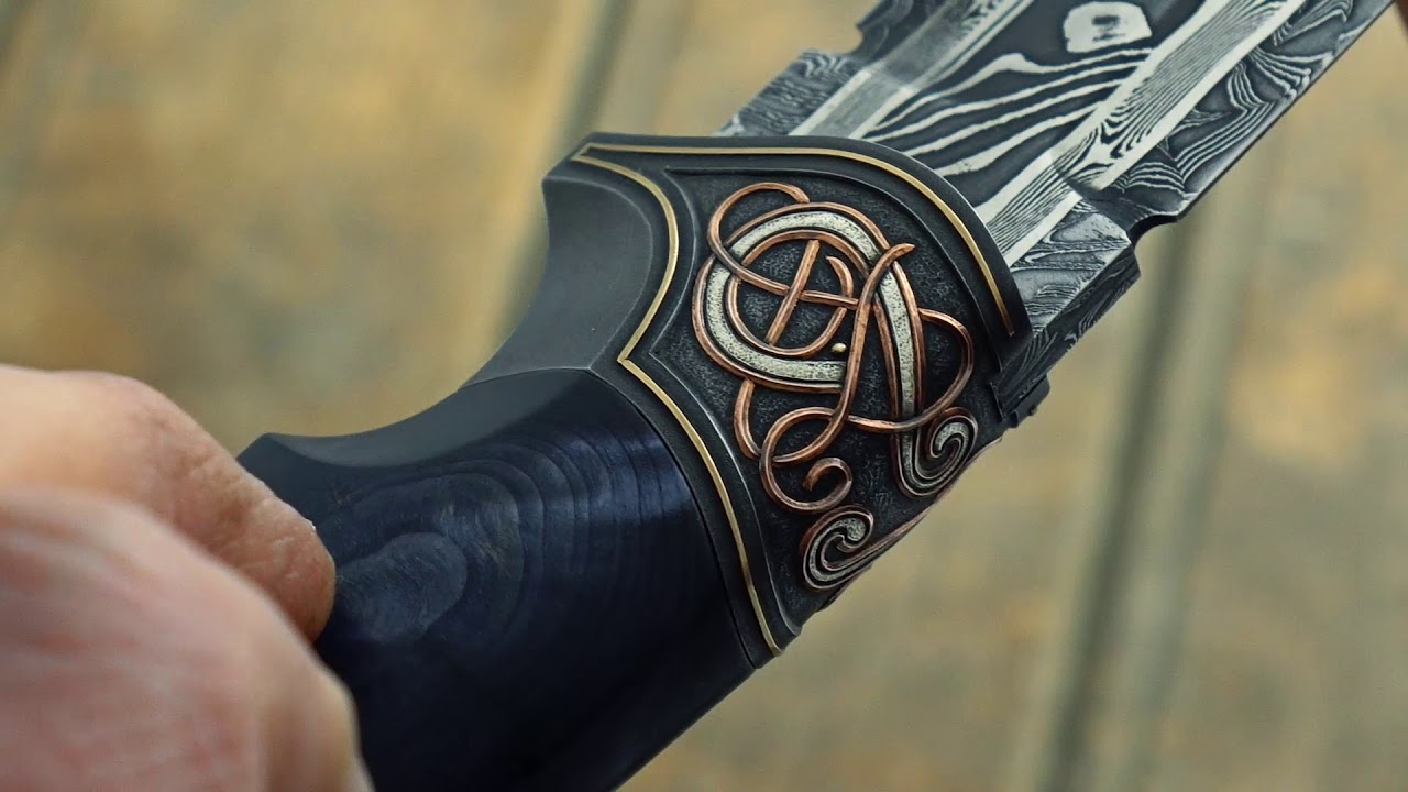 Viking pattern steel engraving on custom knife - YouTube