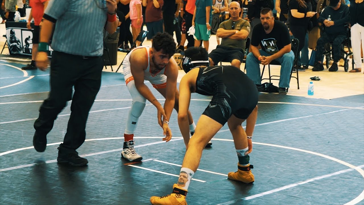 Andru Gomez of Cyclones [R] v. Ryan Schneider of White Tanks WC [G ...