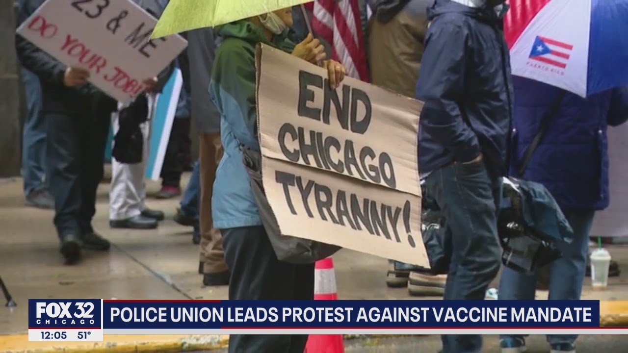 Chicago police union leads protest against vaccine mandate - YouTube