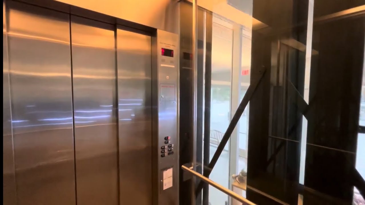 Otis Hydraulic Glass Elevator @ Mint Museum in Charlotte, NC - YouTube