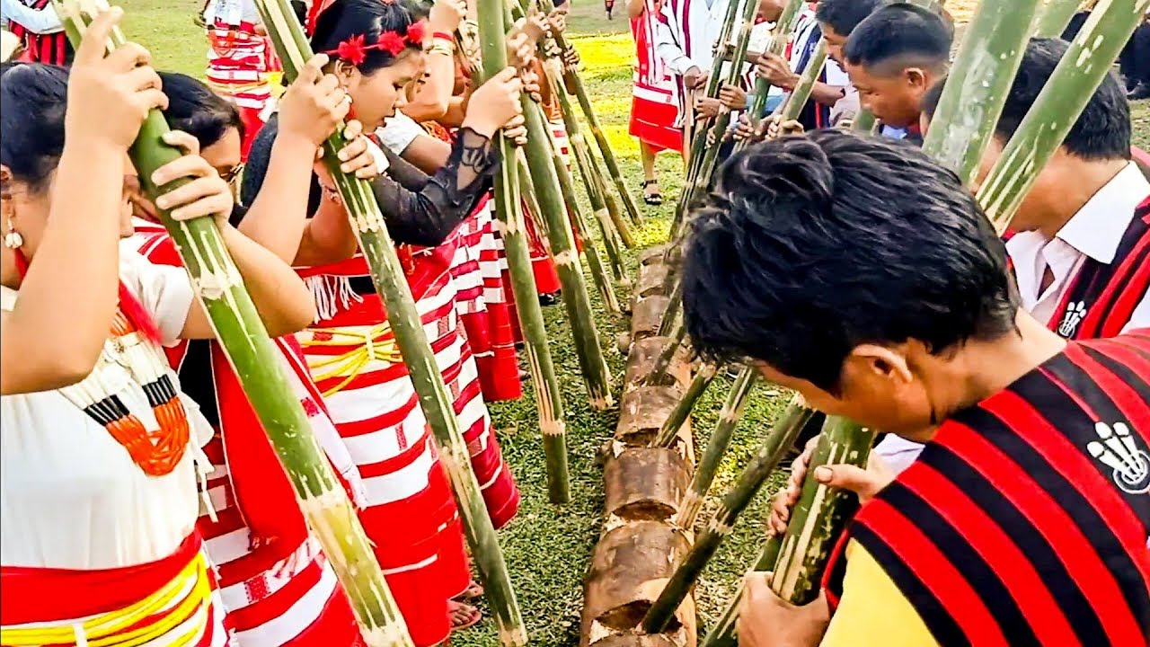 Traditional Naga Rice Pounding Method And Cooking Rice In Bamboo ...