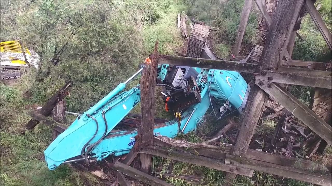 Major excavator crash after this bridge that the Clayton's Towing - YouTube