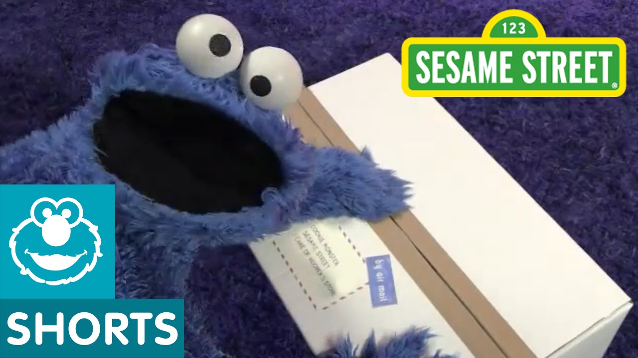 Sesame Street: Cookie Monster Unboxing a Package from the UK - YouTube