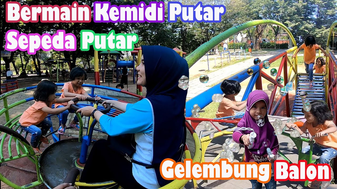 BERMAIN KEMIDI PUTAR - SEPEDA PUTAR - AYUNAN - PEROSOTAN DAN GELEMBUNG BALON DI TAMAN KOTA - YouTube