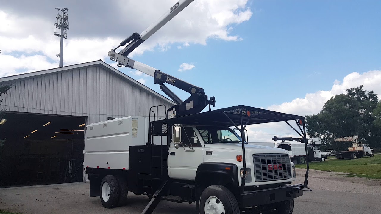 Forestry bucket truck with chipper dump bodies - YouTube