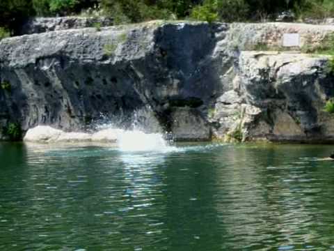 Sam cliff jumping at Blue Hole Georgetown - YouTube