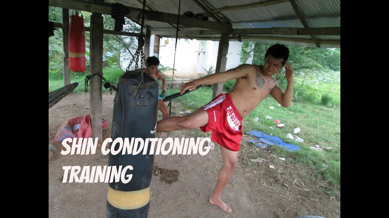 Heavy Bag Shin Conditioning With 10 Year Old Boy (Cambodia) - YouTube