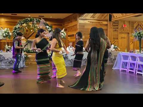 Montagnards dancing at the wedding with the bride.
