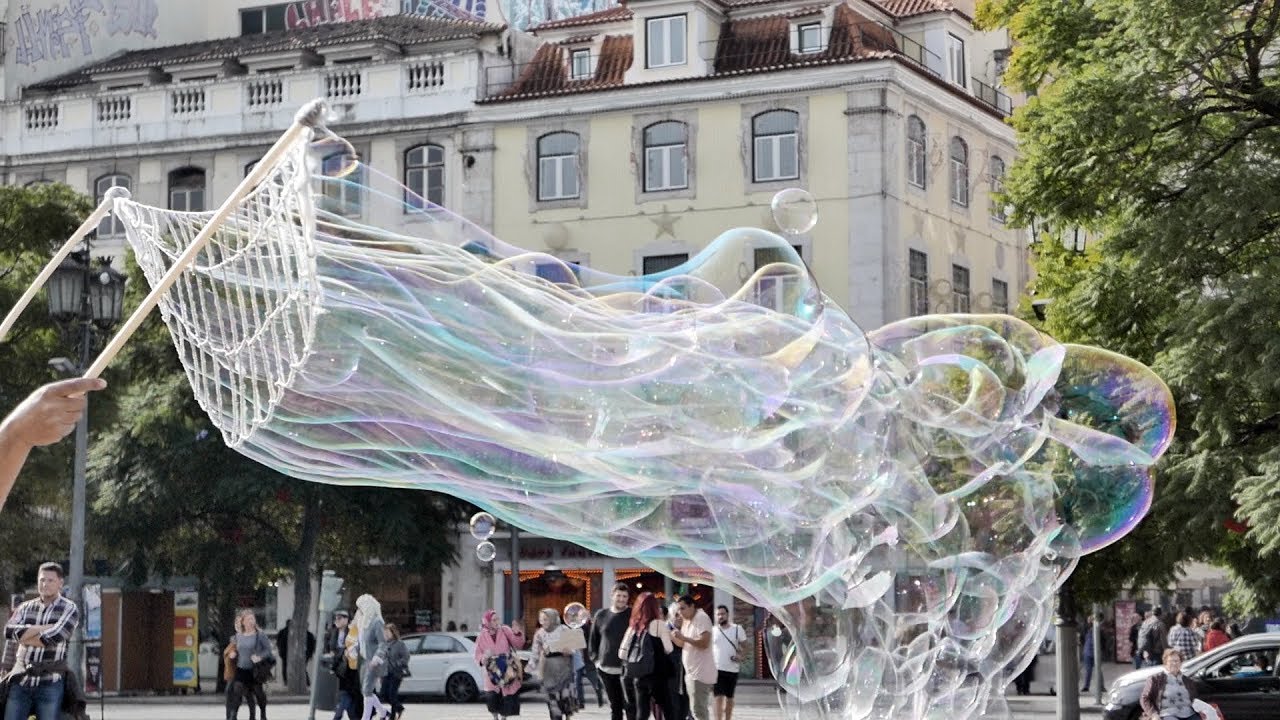 This Street Performer Blows The Most Beautiful Multi Bubbles - YouTube