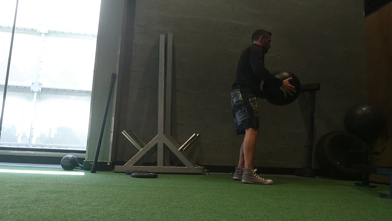 Exercise Library - Ball slam to rotation - single leg - YouTube