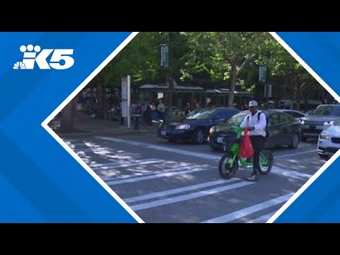 New seated scooters make Seattle debut - YouTube