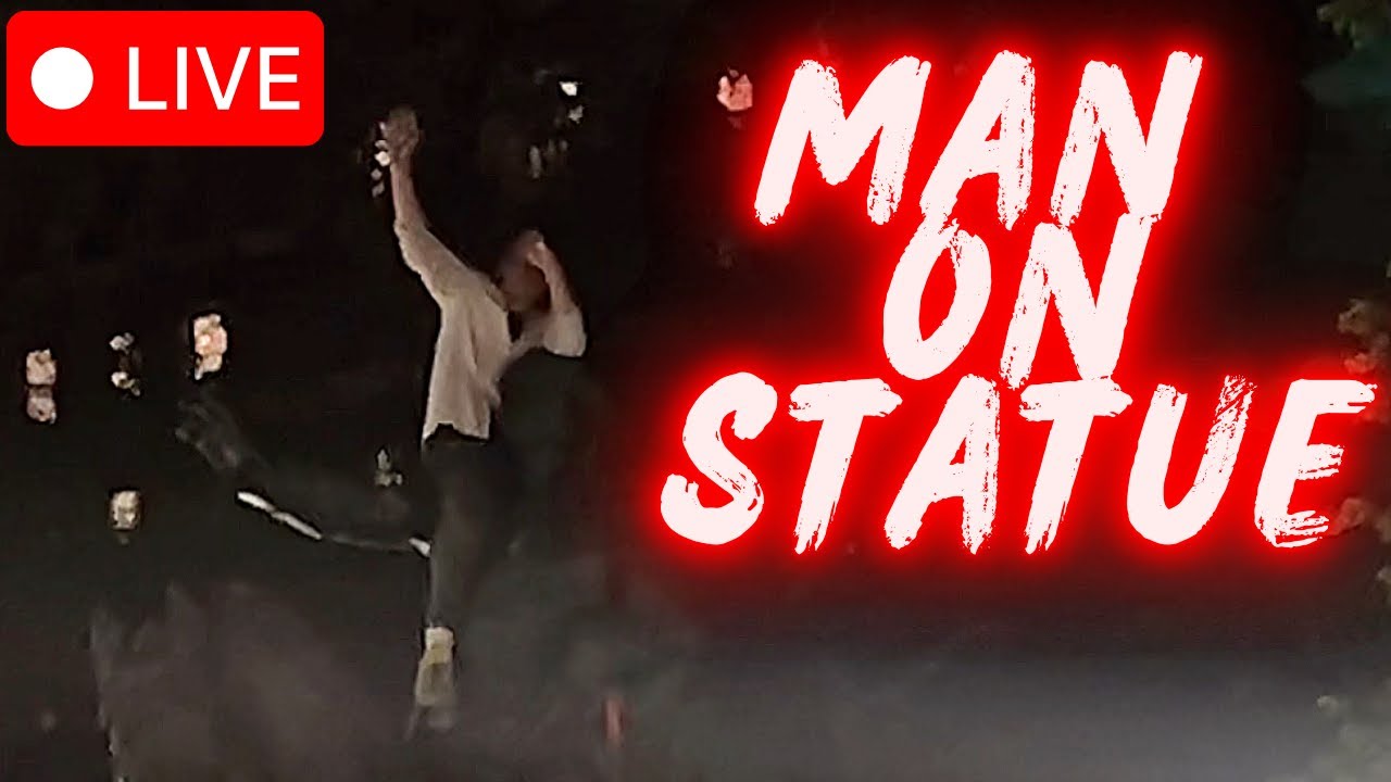 BREAKING NEWS! STANDOFF. MAN REFUSING TO COME DOWN FROM STATUE - YouTube