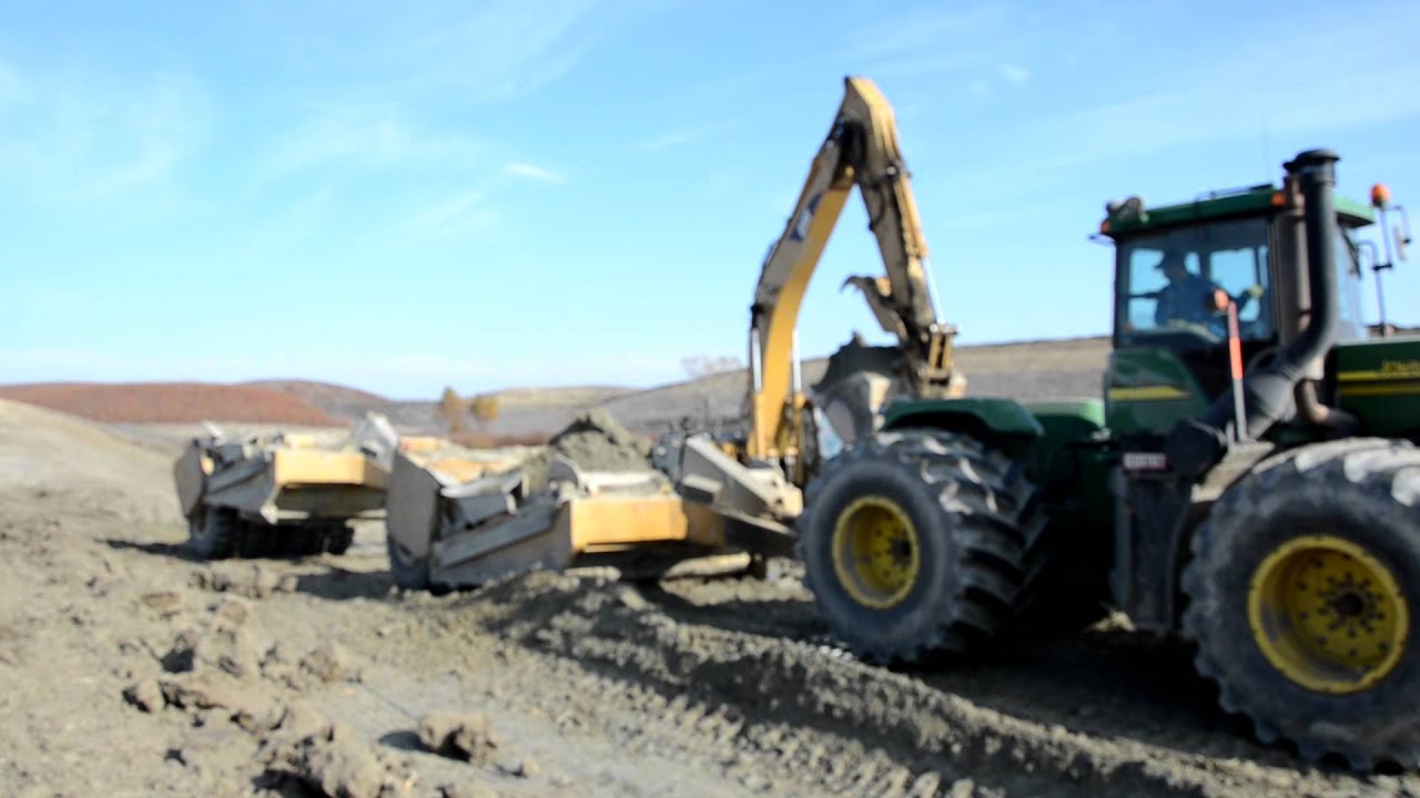 Excavator Top Loading Scraper Cans to Build a Pond. - YouTube
