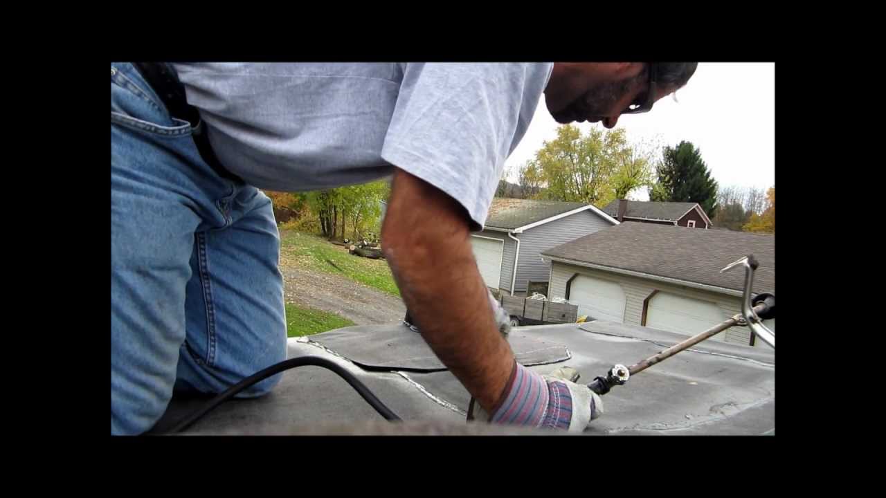 Torch Applied APP Modified Bitimen to Mobile home trailer. Flat Roof ...