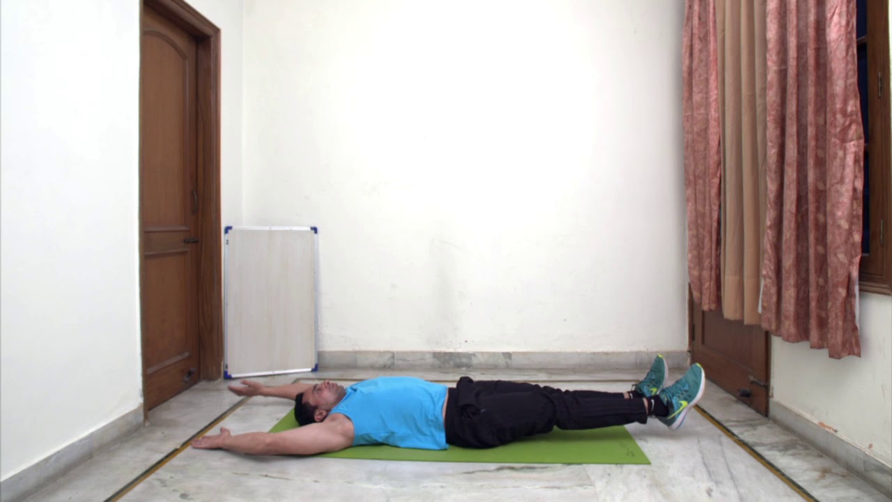 How to do lying opposite toe touch exercise properly? - YouTube