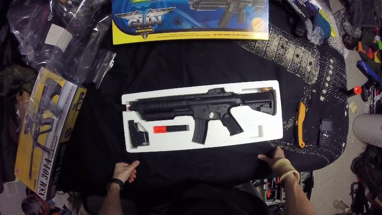 Unboxing the Mini M4 pump action rifle - YouTube