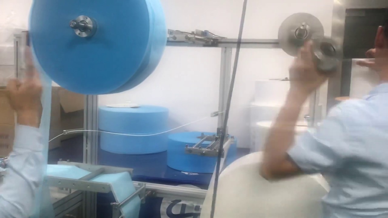 Fabric loading tutorial mask machine - YouTube