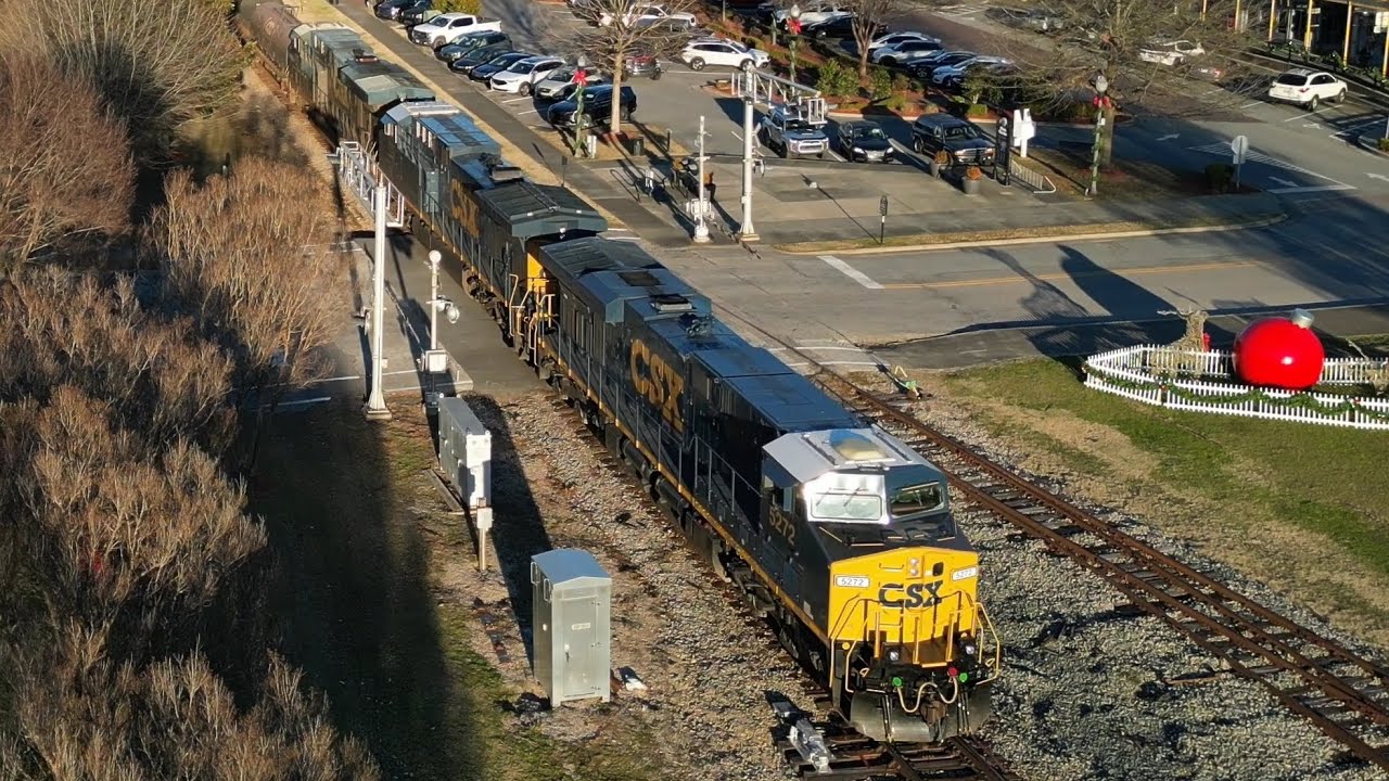 CSX M605 Freight Train rolls Straight into the Sunlight || DJI Mini 3 ...