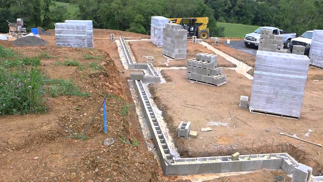 Mason setting 1st course of Nexcem Blocks - YouTube