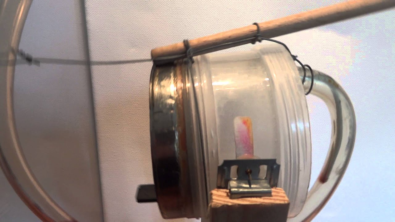 Not solar Rocky stirling engine (candle) . Red wine piston - YouTube