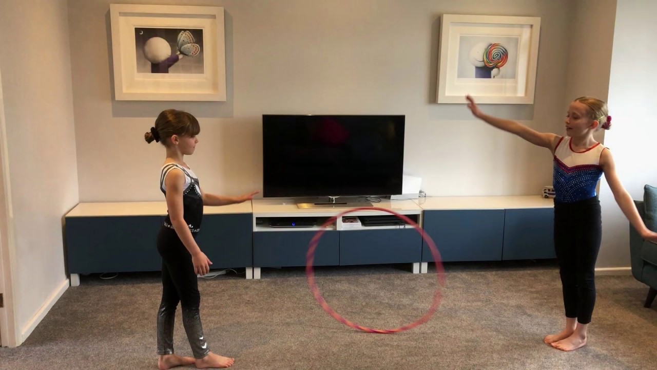 With partner, roll & catch a ball or hoop - YouTube