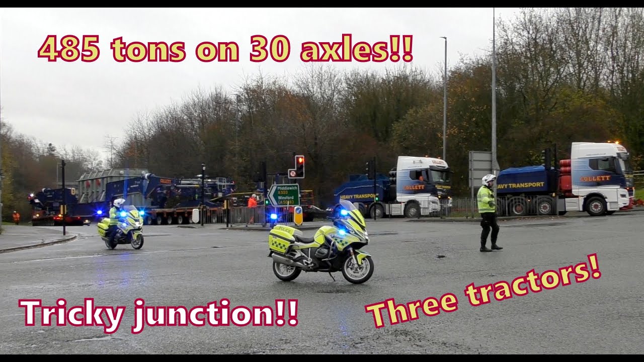 MASSIVE load, 485 ton on 30 axles!!! Negotiates SMALL roundabout ...