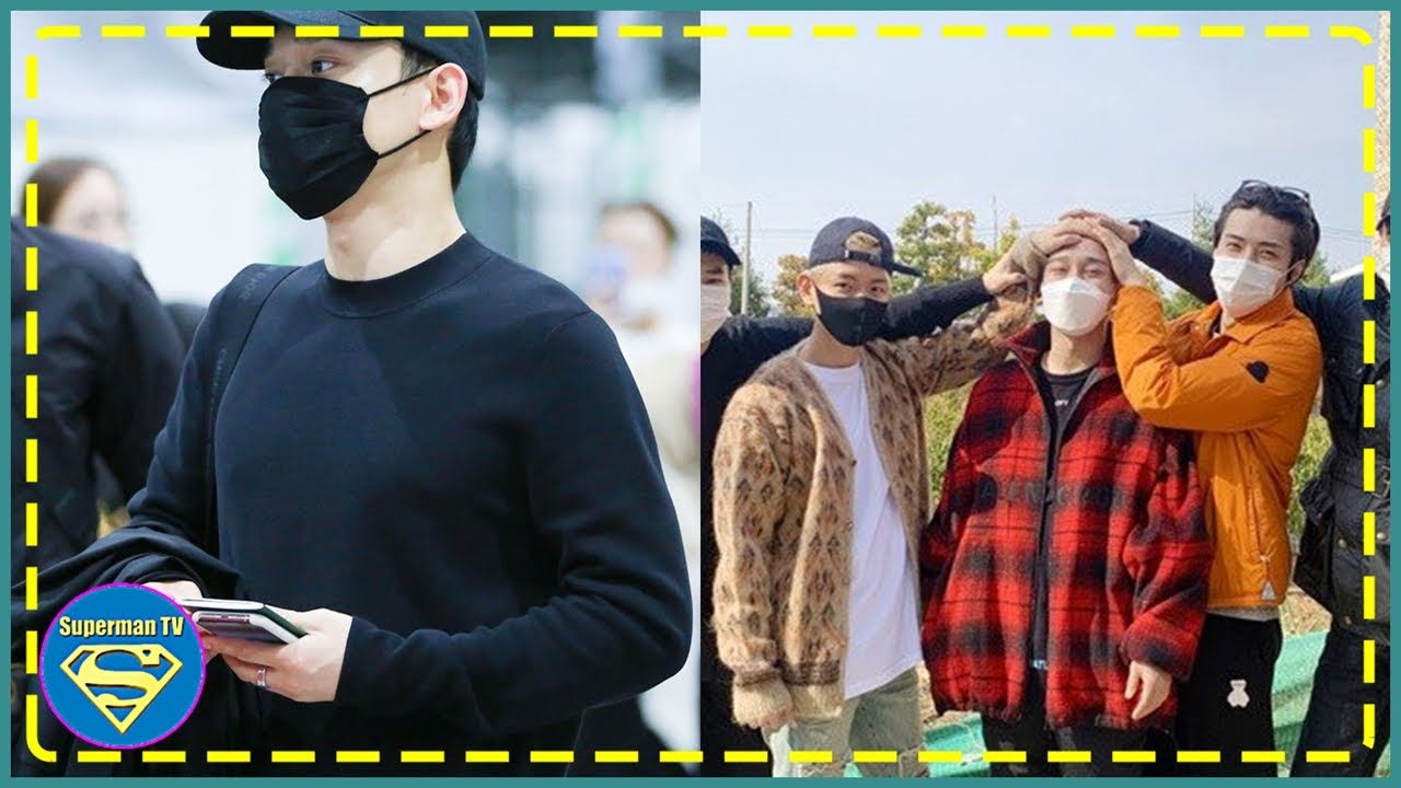 EXO members pose for photos with Chen only moments before his military ...