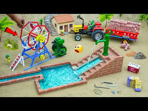 DIY Mini Tractor Builds Ferris Wheel & Hand Pump | Using Bricks Village Water Project | @topminigear