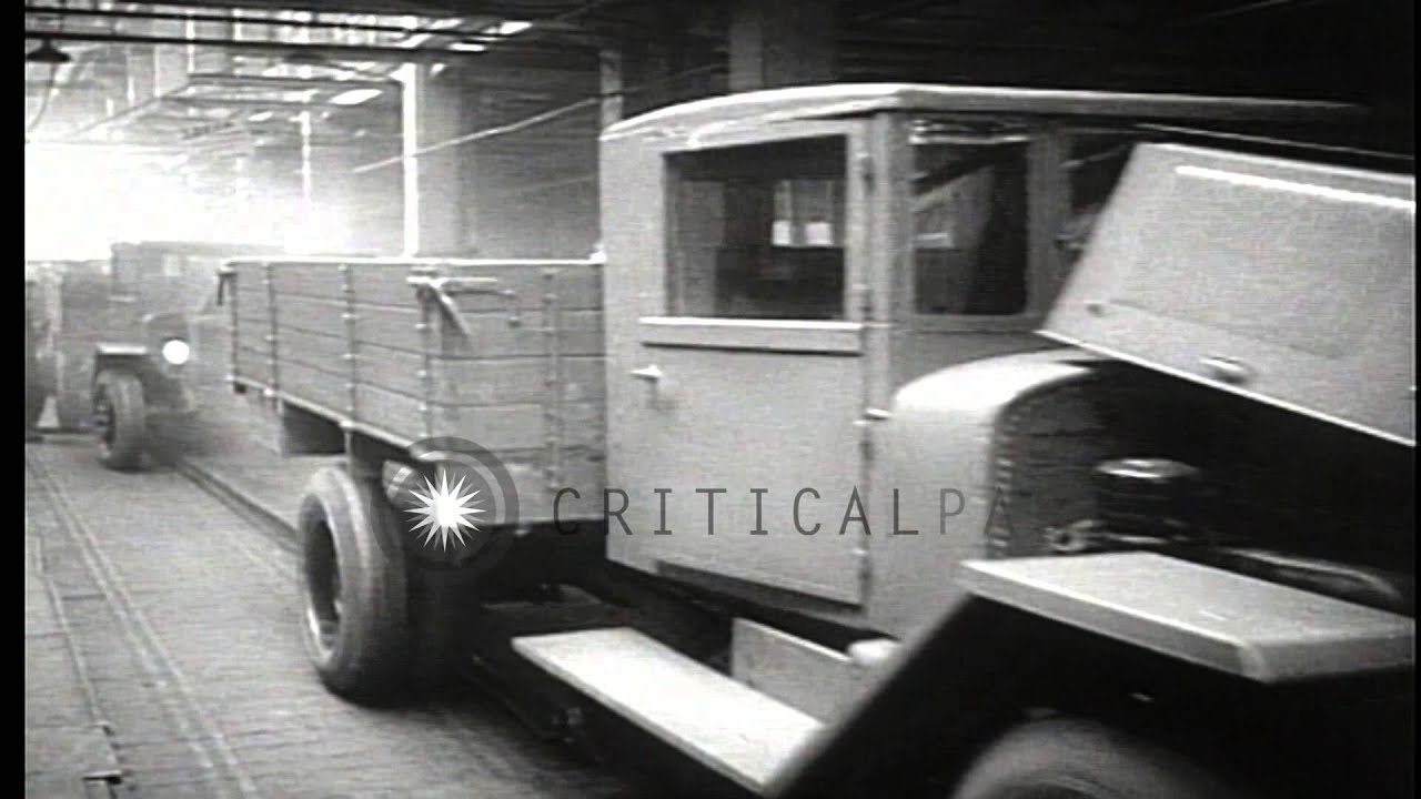 Russian workers work in a truck factory in Moscow, Soviet Union. HD ...