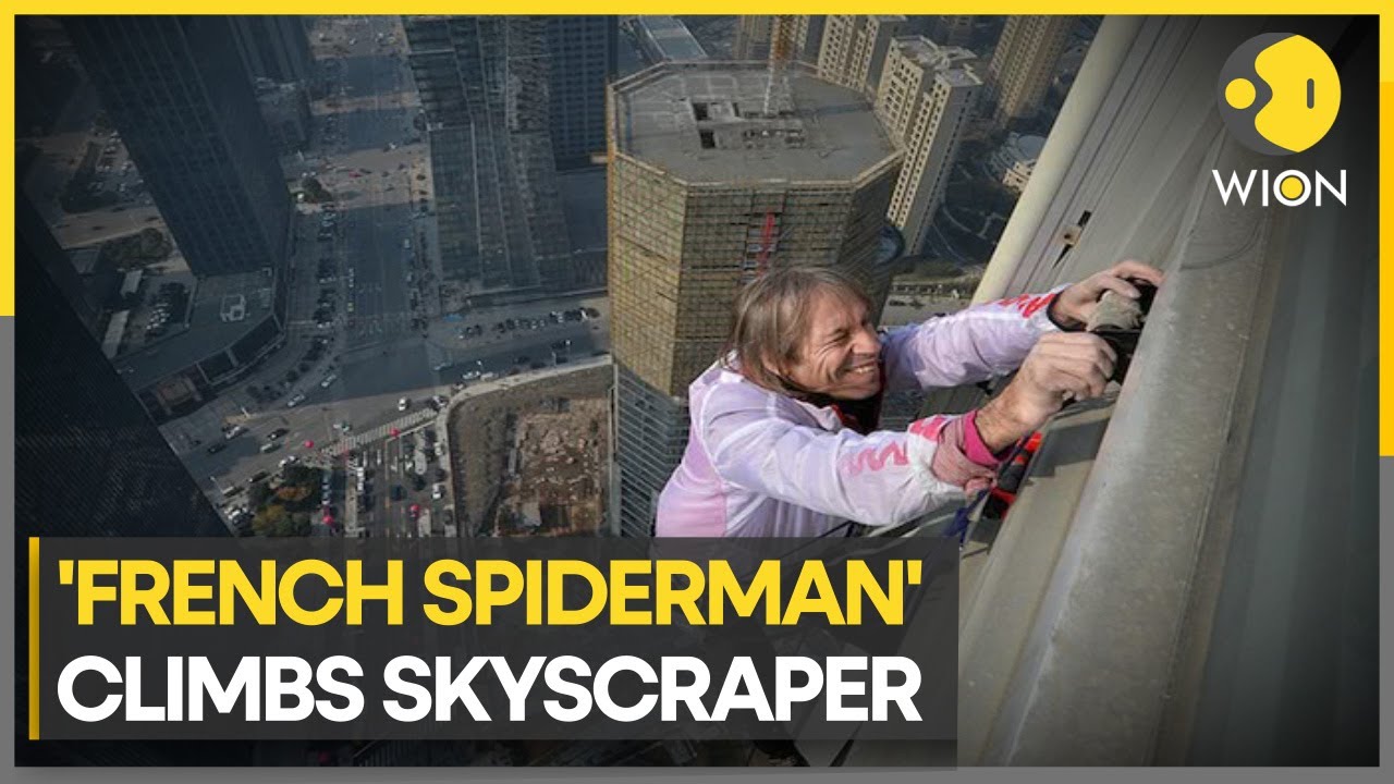 'French Spiderman' Alain Robert climbs skyscraper to protest | Latest ...